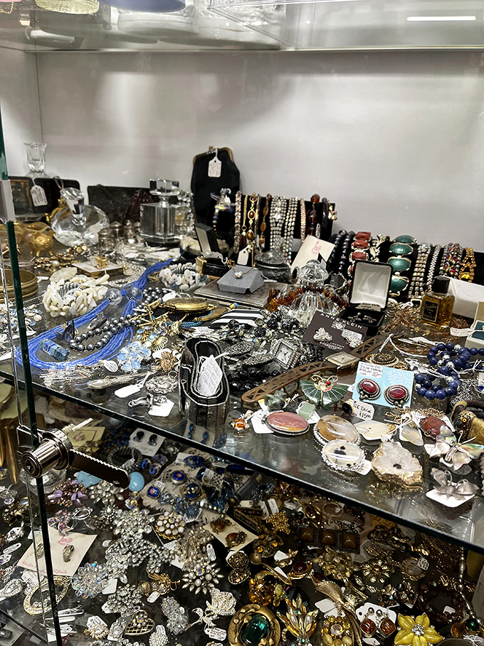 A jewelry case that sparkles with history—each brooch and necklace once dressed someone's grandmother for a special occasion.