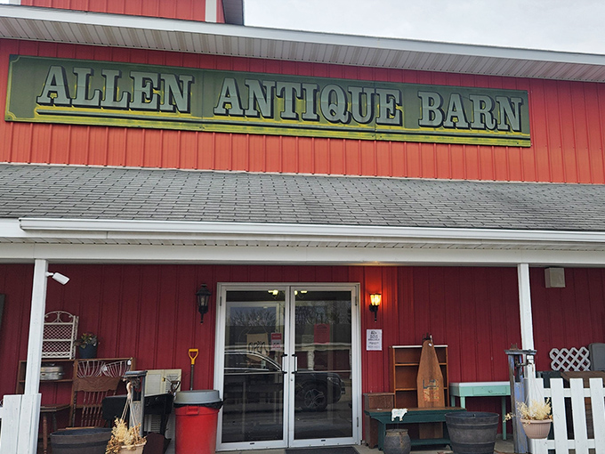 The red barn exterior promises authentic country charm and genuine treasures waiting inside this rustic paradise.