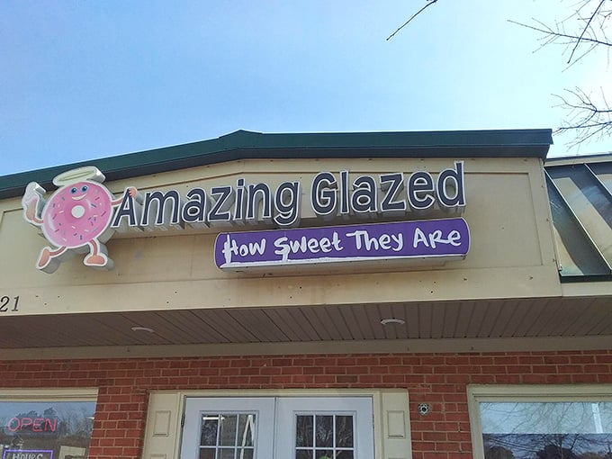 That cheerful pink donut mascot tells you everything - this place doesn't take itself too seriously.