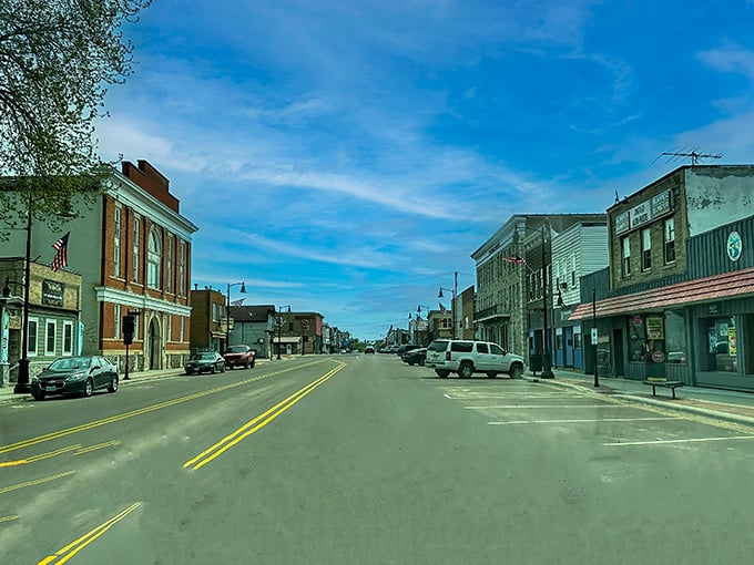 Antigo&rsquo;s quiet main street stretches wide under blue skies, where everyday charm meets small-town value