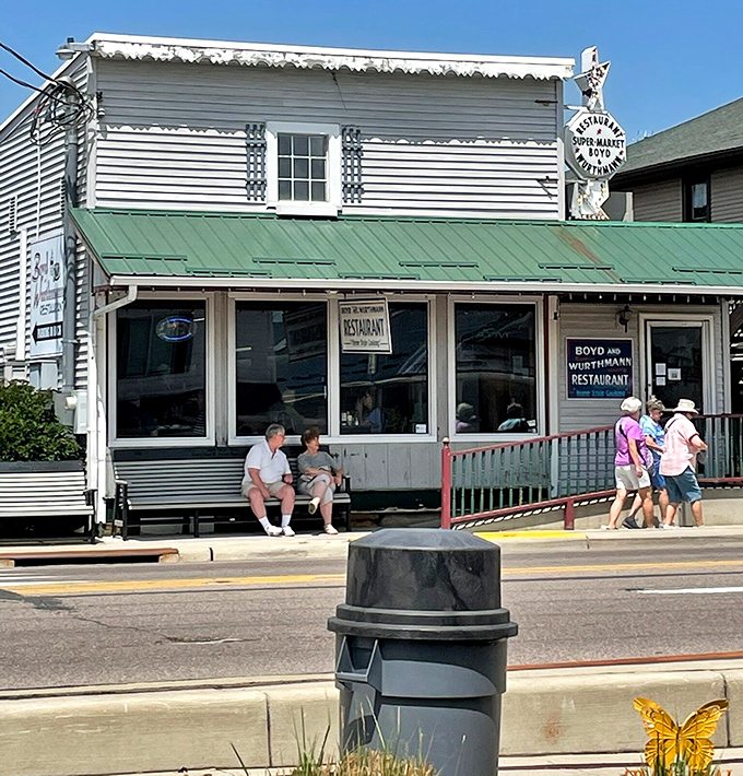 The bakery side of Boyd & Wurthmann where sugar-dusted magic happens behind those windows.