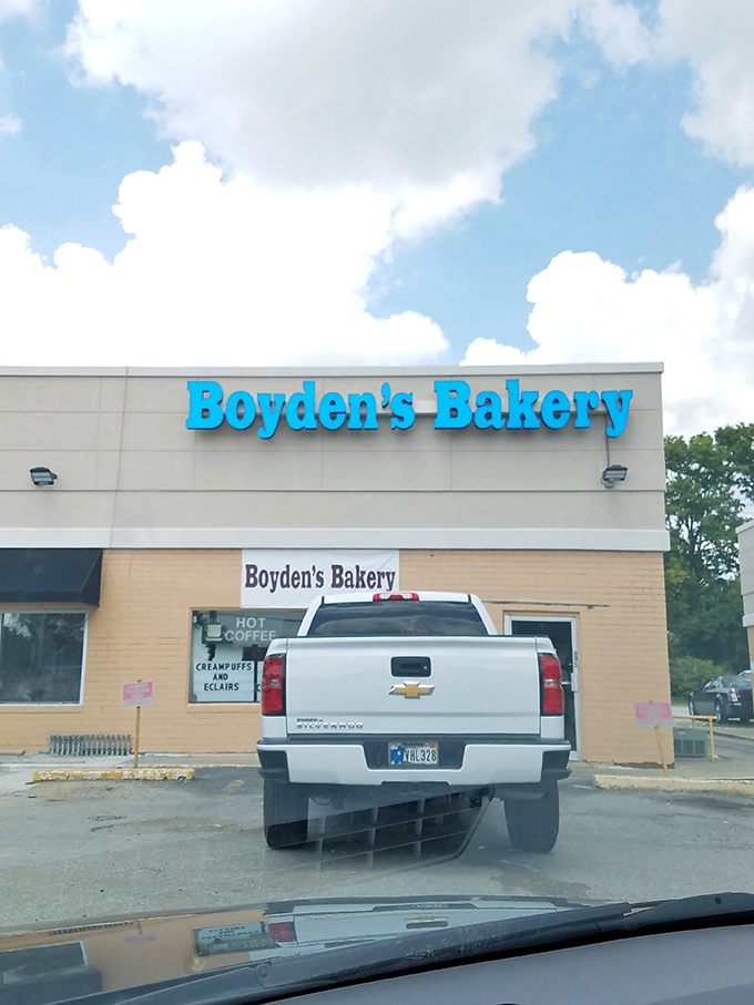 That electric blue sign is like a bat signal for donut lovers across Indianapolis's southside.