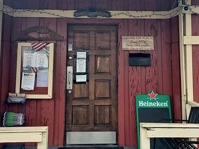 Behind that weathered red door lies the kind of neighborhood seafood joint where regulars become family members.