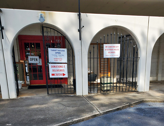 Cathedral Thrift House's arched entrance feels like stepping into a sanctuary of savings and second chances. 