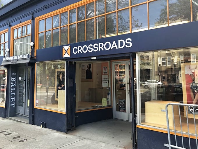 Crossroads Trading's boutique-style windows showcase the elevated secondhand shopping experience that awaits treasure hunters.