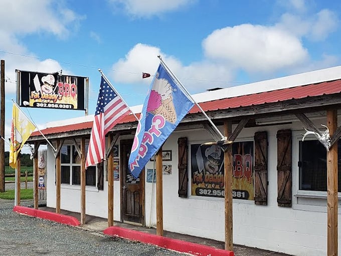 Patriotic flags and rustic charm signal that this Georgetown spot takes both barbecue and community seriously.