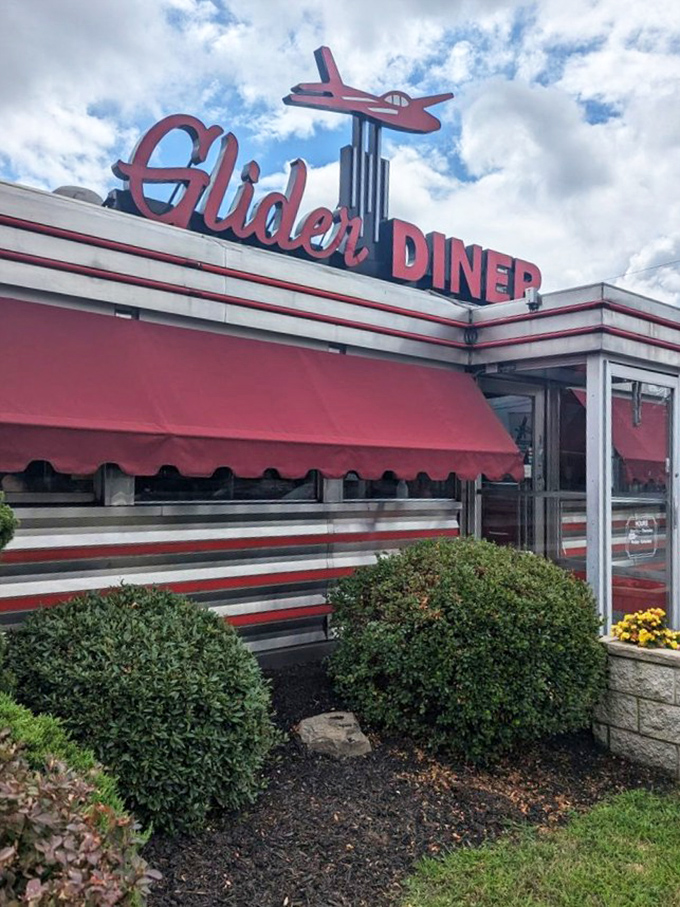 Glider Diner's red awnings and retro airplane logo promise food that will make your taste buds soar. The gravy alone deserves its own flight plan!