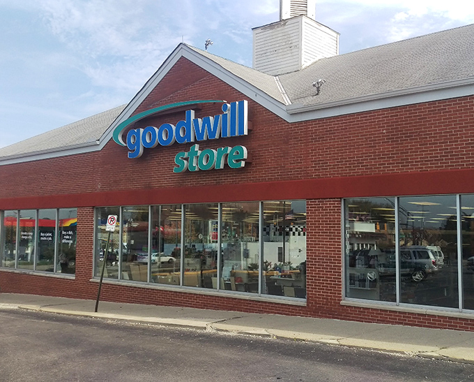 Goodwill's iconic red brick building stands ready to fulfill your thrifting dreams and support the community.