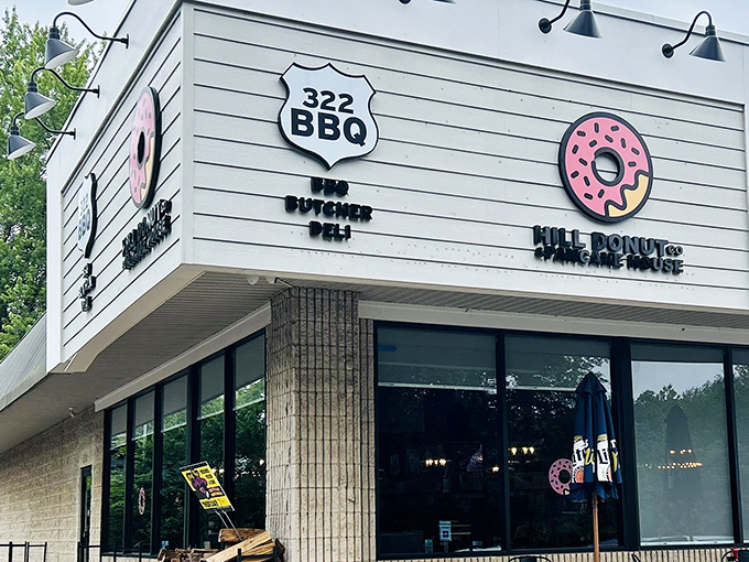 Hill Donut's modern exterior hides old-fashioned donut wisdom inside, where glazed perfection meets its coffee soulmate daily.