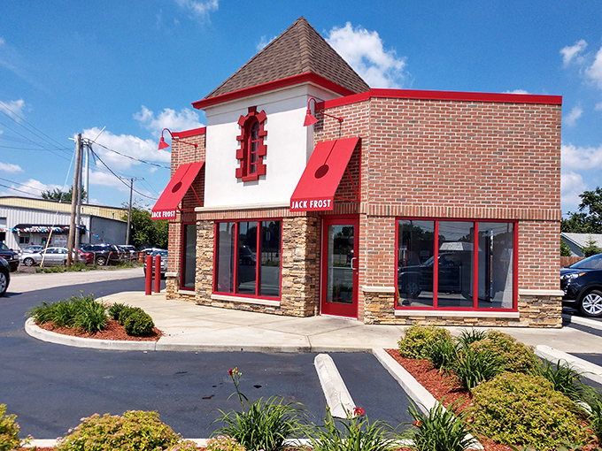 This brick beauty with red trim stands ready to warm your heart and satisfy your sweet tooth.