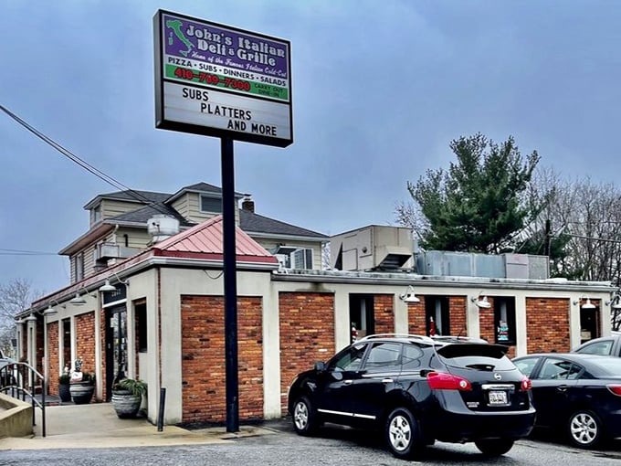 John's Italian Deli's unassuming exterior hides culinary treasures within. That sign has guided hungry Baltimoreans for generations!