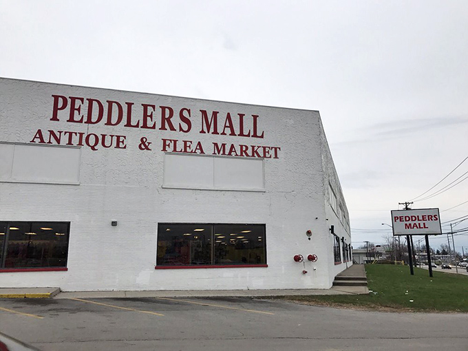 Peddlers Mall's classic storefront promises adventures in bargain hunting. Behind that white facade lies a labyrinth of treasures!