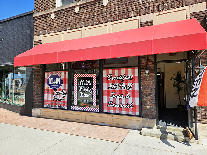 M&M Family Diner's red awning is like a culinary red carpet, inviting you to be the star of your own breakfast blockbuster, "Honey, I Ate The Menu."
