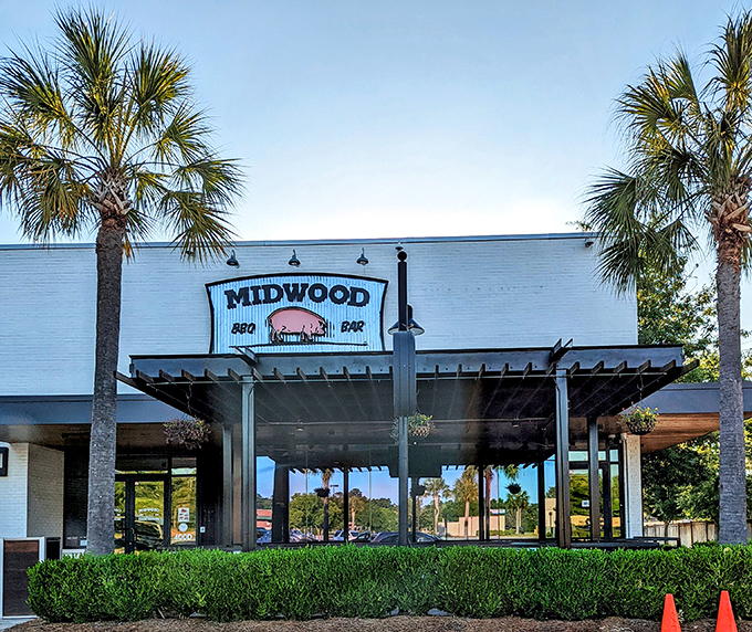 Midwood's palm-flanked entrance offers a breezy welcome to serious barbecue business.