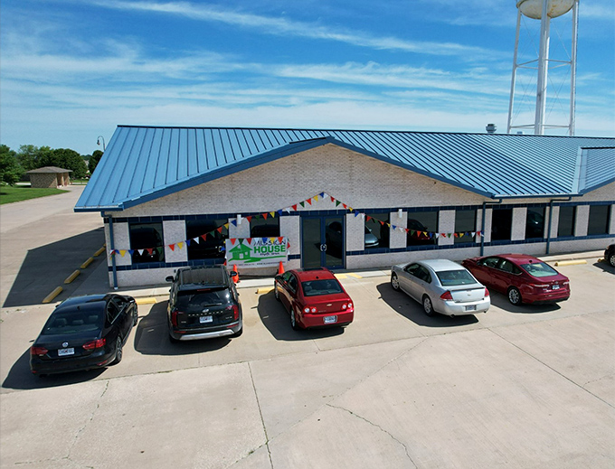 That distinctive blue roof stands out like a lighthouse guiding bargain hunters to their destination.
