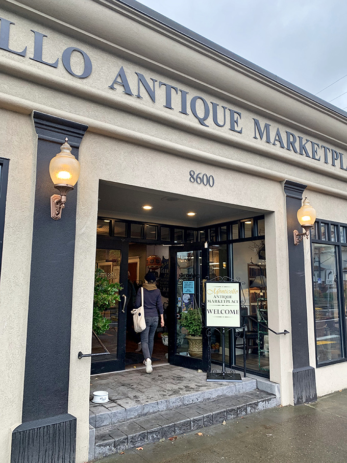 The elegant entrance promises serious antiquing adventures behind those welcoming glass doors.