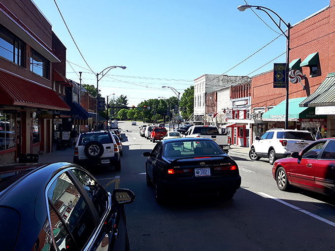 A sunny day in Mount Airy, where small-town charm fills the streets and the hustle of daily life hums quietly beneath the clear blue sky.