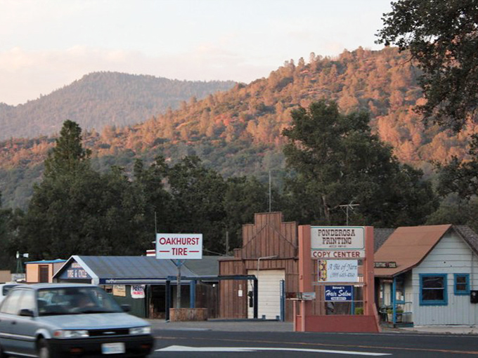 The golden hour bathes Oakhurst in warm light, highlighting why this gateway to Yosemite makes a perfect retirement haven.