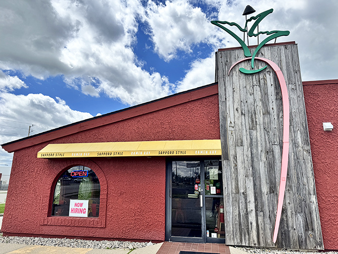 That whimsical wooden noodle sculpture tells you everything - this place takes fun as seriously as it takes flavor.