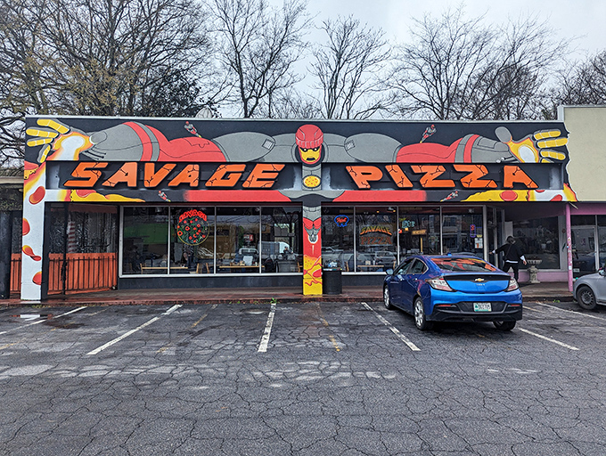 Savage Pizza's mural screams rebellion louder than a punk rock concert, promising flavors that break every conventional rule.