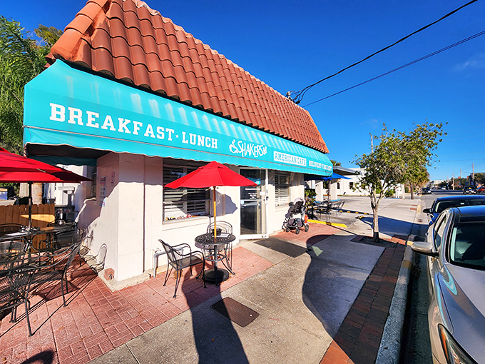 Turquoise awnings and red tile roofs create the perfect backdrop for comfort food that matches the vibrant colors.