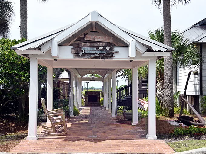Skipper's elegant white columns lead to brick pathways and waterfront views &ndash; Southern charm meets fresh-caught delights.