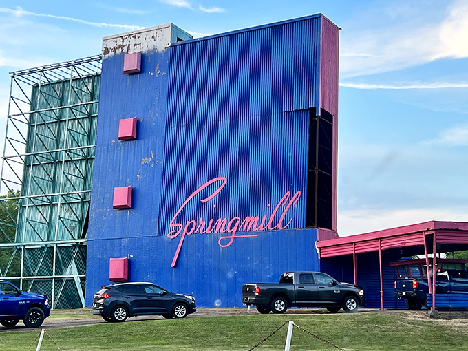 The colorful Springmill sign beckons like a beacon of nostalgic entertainment from simpler times.