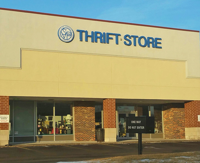 St. Vincent de Paul's simple signage offers no hint of the high-end castoffs from wealthy suburbs hiding inside.