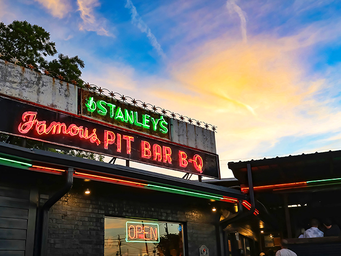 Stanley's neon sign glowing against a sunset sky is basically Texas poetry written in electricity and smoke.