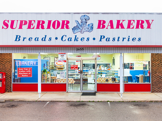 Red and white cheerfulness announces a bakery that takes both donuts and customer happiness very seriously indeed.
