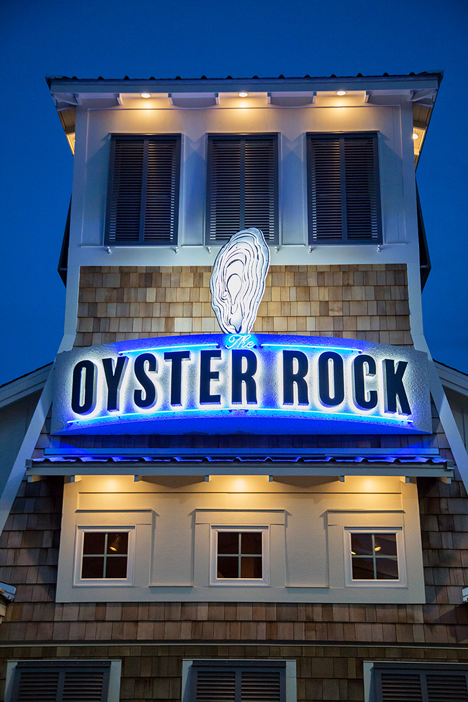 The Oyster Rock's towering presence commands attention like a lighthouse guiding hungry souls to seafood salvation.