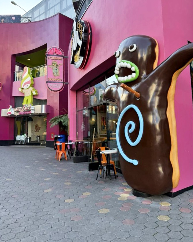 That giant chocolate donut sculpture isn't subtle, but neither is the joy you'll feel taking your first bite.