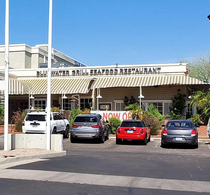 Those striped awnings and palm trees transport you straight to Santa Barbara without leaving Phoenix.