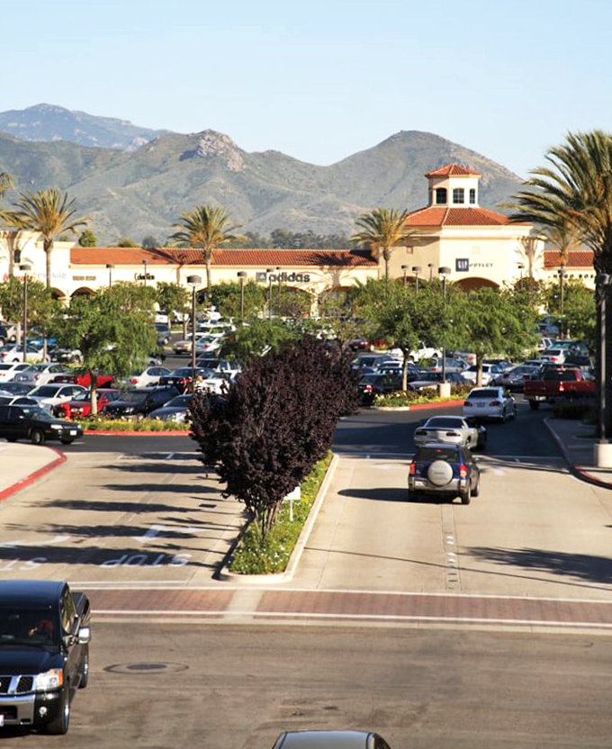 Spanish-style architecture making outlet shopping feel like a Mediterranean vacation, minus the expensive airfare.