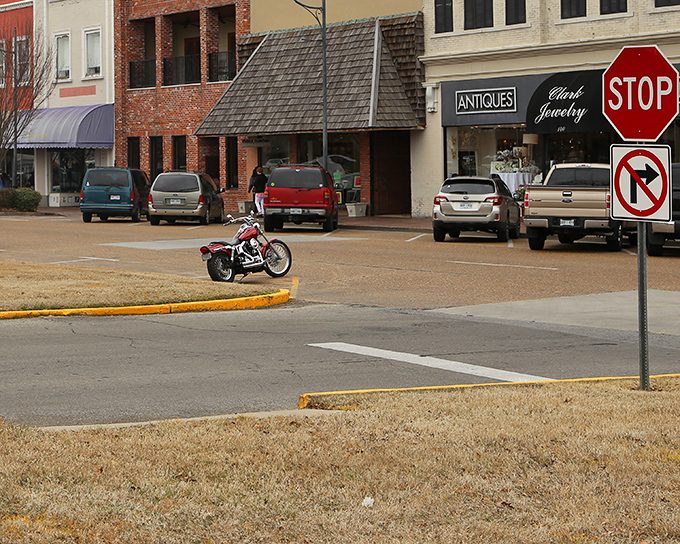That red motorcycle parked in Cleveland's intersection screams rebellion against high cost of living everywhere else.