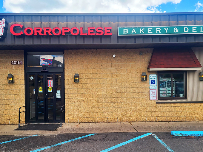 The green and red sign says "Bakery & Deli," but locals know it really means "Tomato Pie Headquarters."
