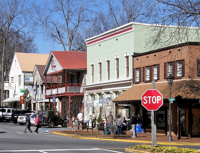 Historic buildings stand shoulder to shoulder, creating the perfect small-town movie set atmosphere.