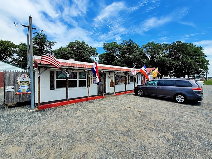 The weathered wood exterior promises authentic flavors that have been perfected over countless smoking sessions.