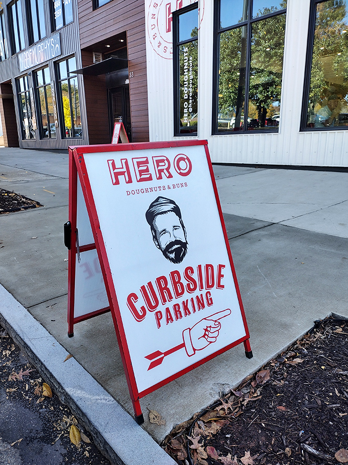 That sidewalk sign knows exactly how to make curbside parking feel like a heroic quest.