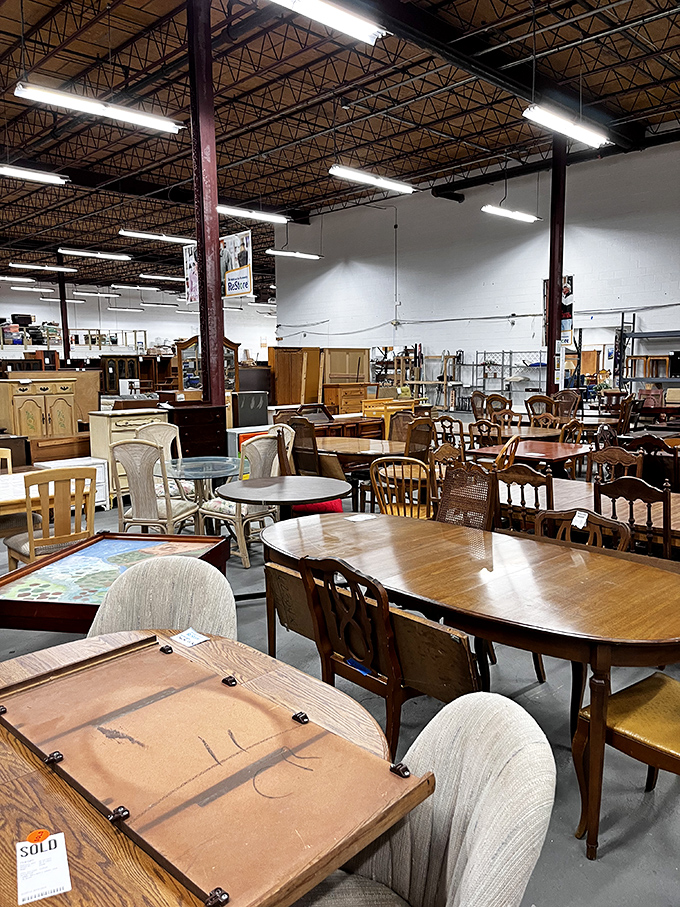 The warehouse interior of ReStore showcases dining sets and furniture pieces that could transform any home at fraction retail prices.