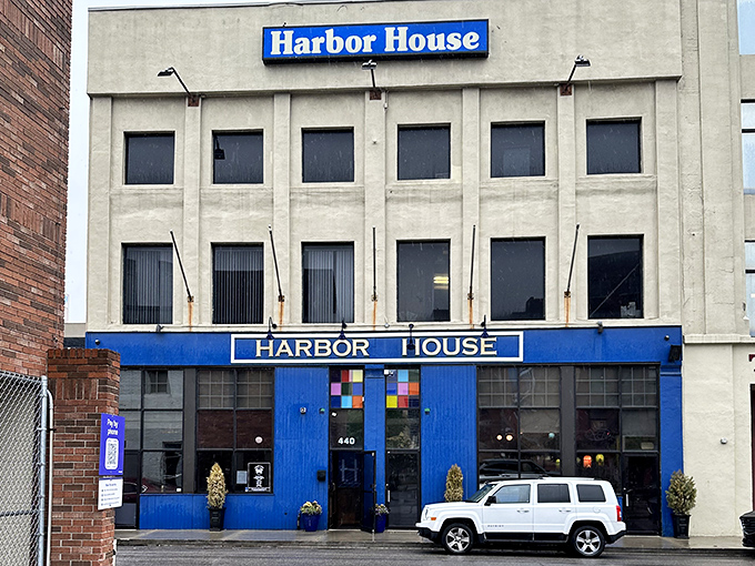Harbor House's colorful entrance promises oceanic adventures in the heart of Motor City's urban landscape.