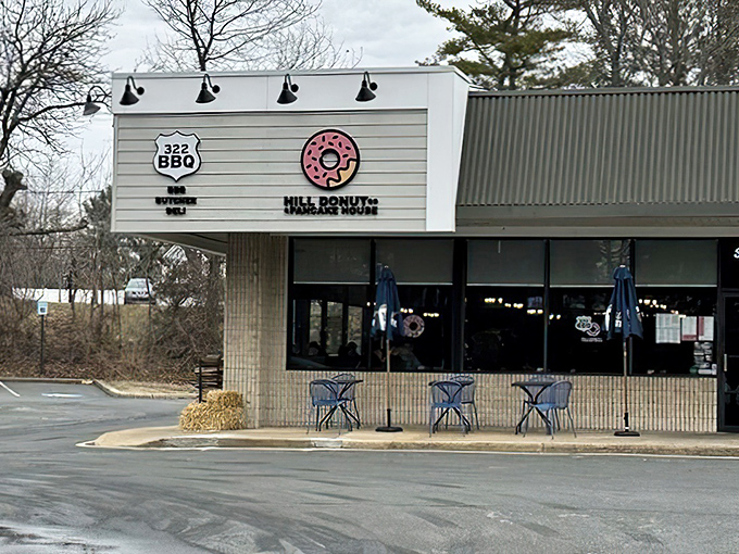 Clean lines and a pink donut logo &ndash; it's minimalist architecture with maximum sugar potential lurking within.