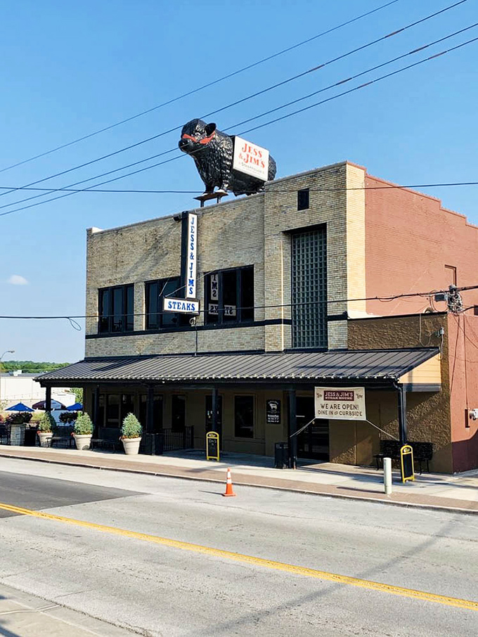 Classic brick and vintage signage signal the kind of timeless steakhouse experience that never goes out of style.