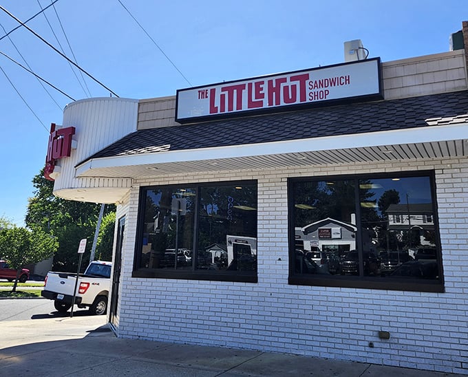Bright white brick and vintage signage announce The Little Hut's presence. A sandwich landmark that's been satisfying Ridley Park appetites for decades.