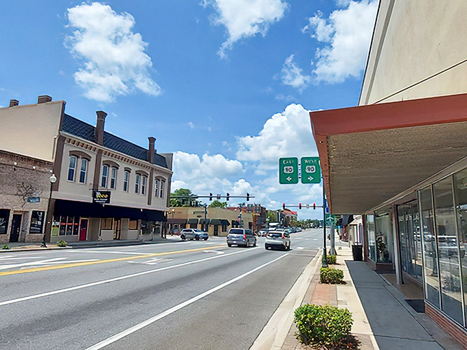 Classic storefronts and shaded sidewalks create the perfect setting for leisurely afternoon strolls and conversations.