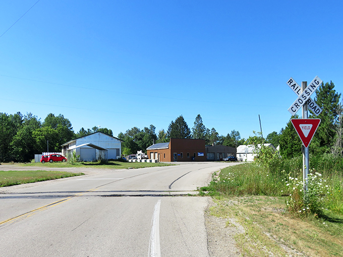 A classic small-town intersection in Marinette where the most stressful decision might be which local restaurant deserves your business tonight.