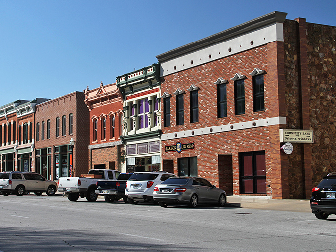 The Avenue Theatre marquee glows like a beacon of entertainment from Hollywood's golden age, still drawing crowds today.