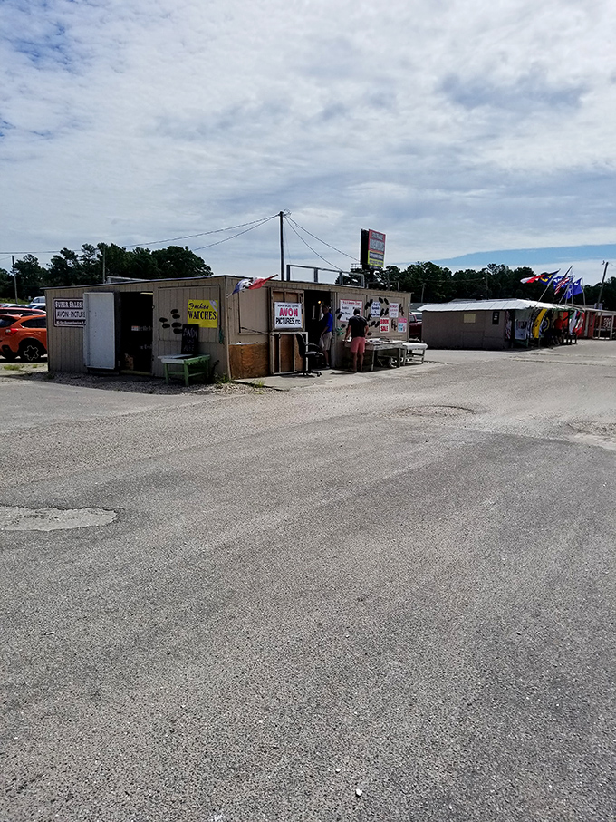 Small vendor stalls at NMB Flea Market in Little River, offering a variety of goods.