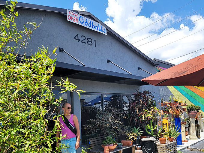 Tropical plants and colorful awnings set the stage for truly unique shopping adventures inside.