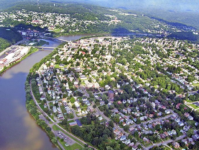 Oil City spreads out beneath rolling green hills, a patchwork quilt of homes and history.